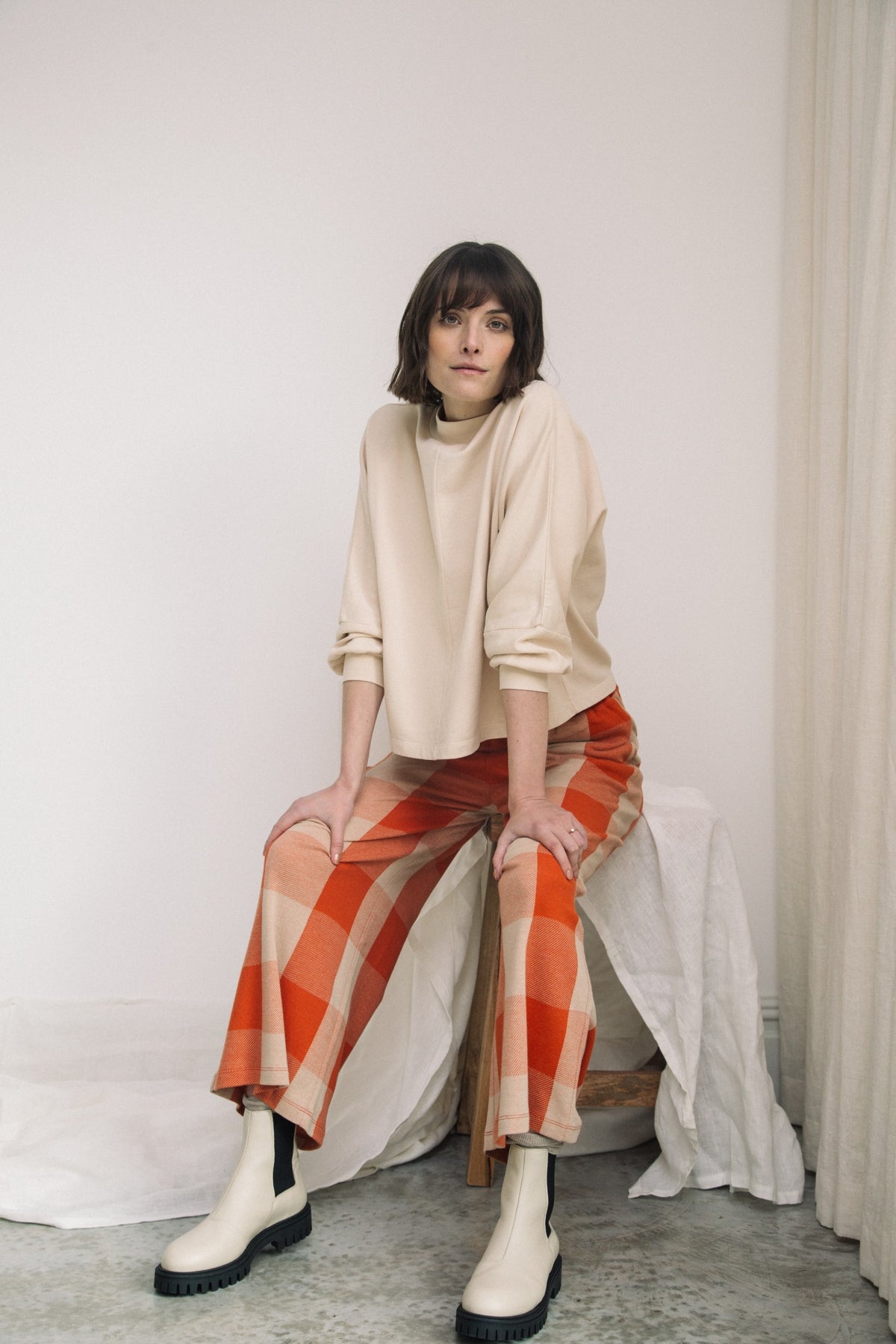 Thorne-Cay Organic Cotton Knitted Check Trouser in Brick and Sand ...